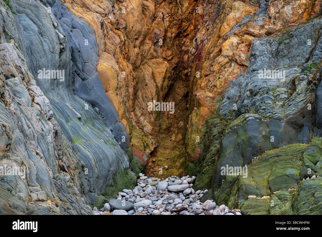 Spain, Barrika. Contorted rock layers on beach Stock Photo - Alamy