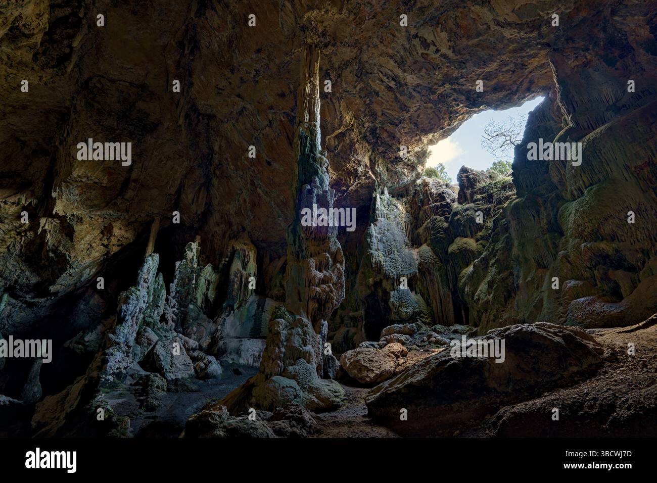 Dramatic interior of a natural cave in Spain, featuring striking ...