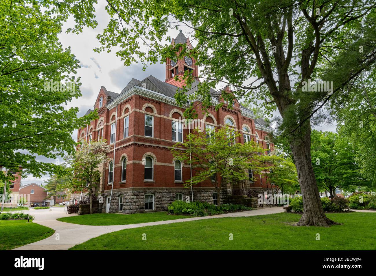 Barry County Courthouse in Hastings, Michigan with green trees and blue ...