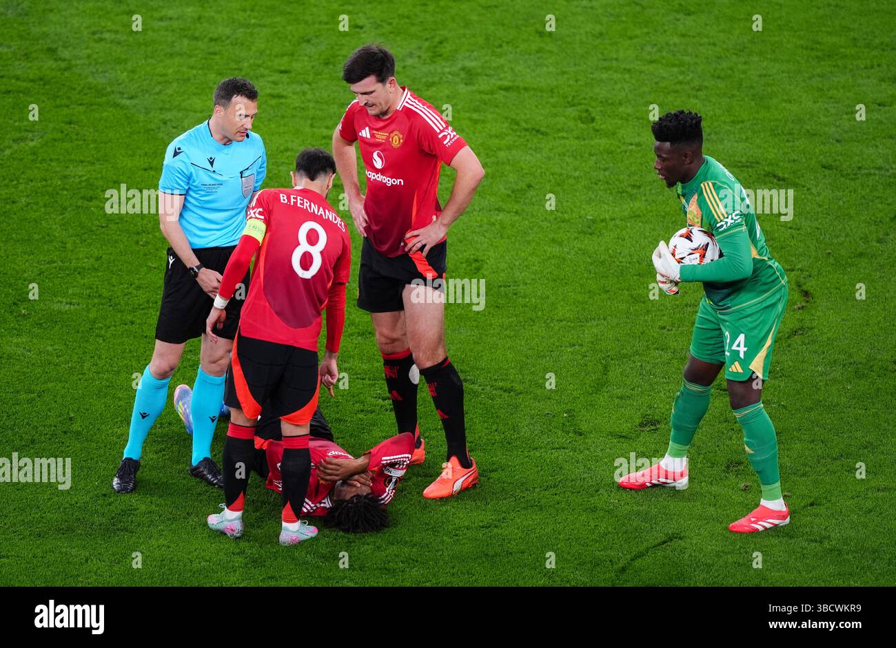 Manchester United's Patrick Dorgu lies injured during the UEFA Europa ...