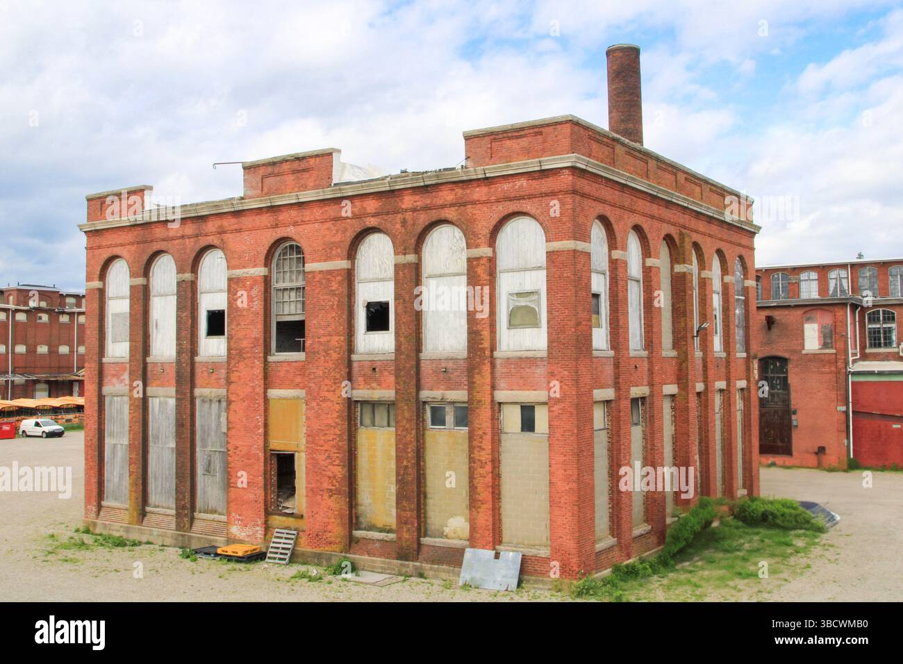 abandoned brick textile mills stand as silent sentinels of a bygone era ...