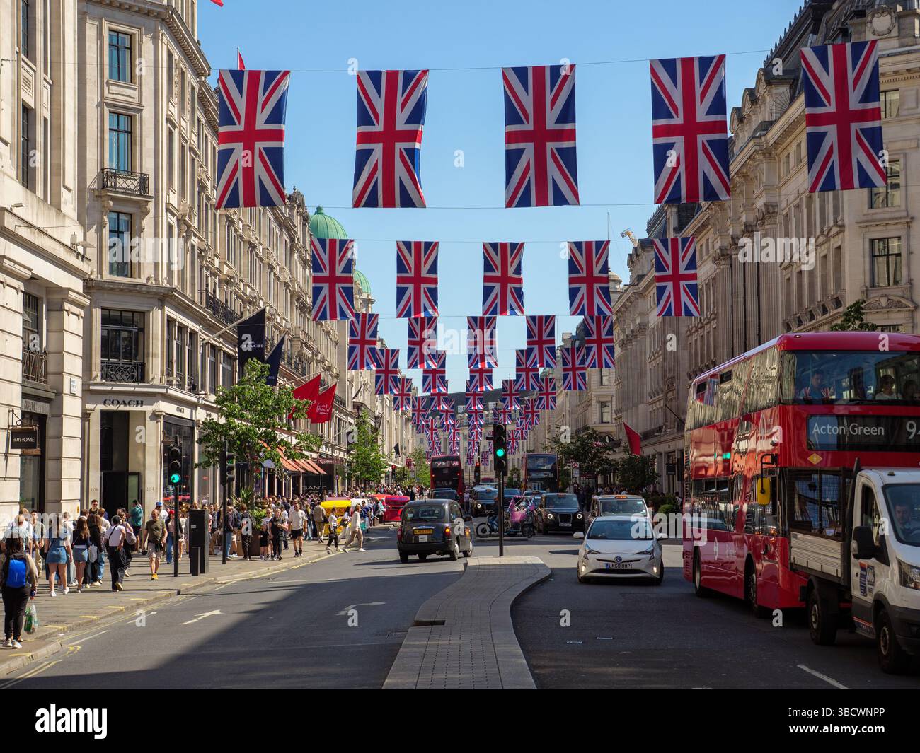 Union Jack flags hanging over Regent Street, West End, Westminster ...