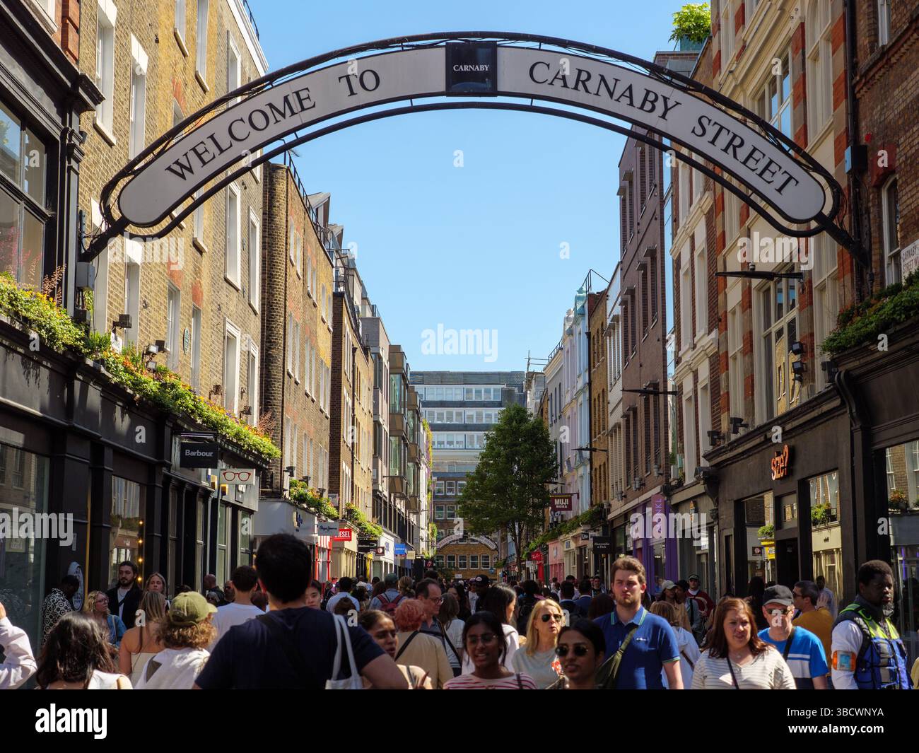 People in busy Carnaby Street in the West End, London, UK Stock Photo ...