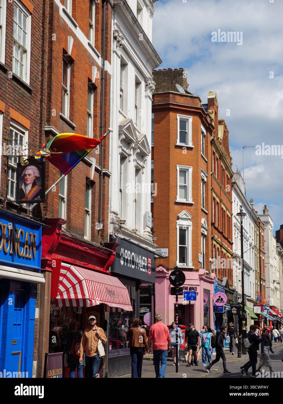 People walking along Old Compton Street, Soho, West End, Westminster ...