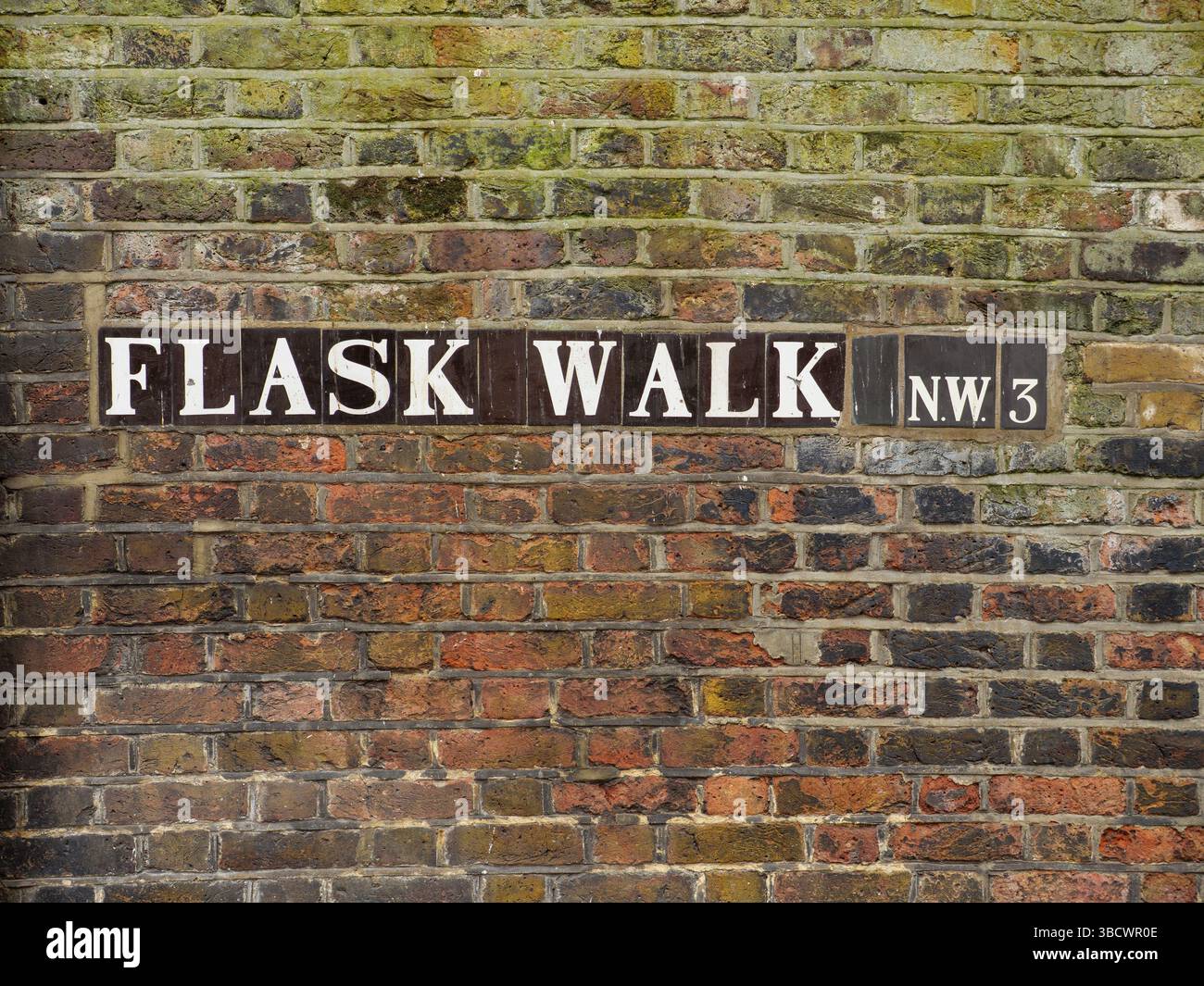 Flask Walk, NW3 street name sign on an old brick wall in Hampstead ...