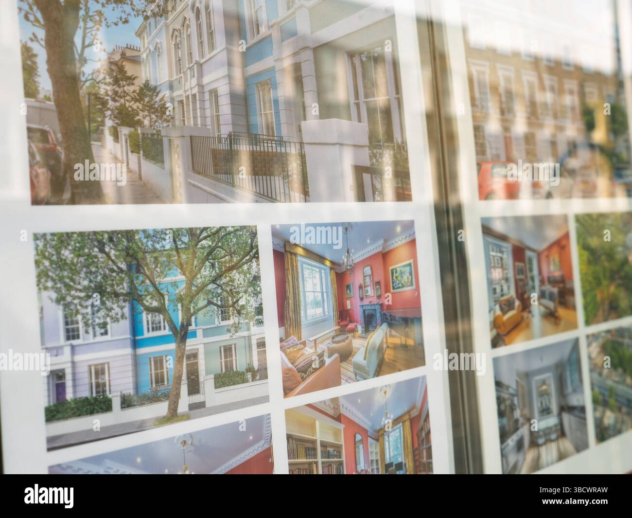Photos of expensive houses being sold in an estate agent window, Camden ...
