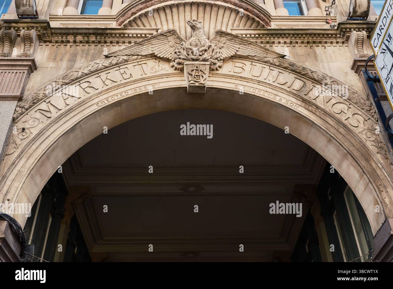 Ornate stone archway with eagle crest above the entrance to Market ...