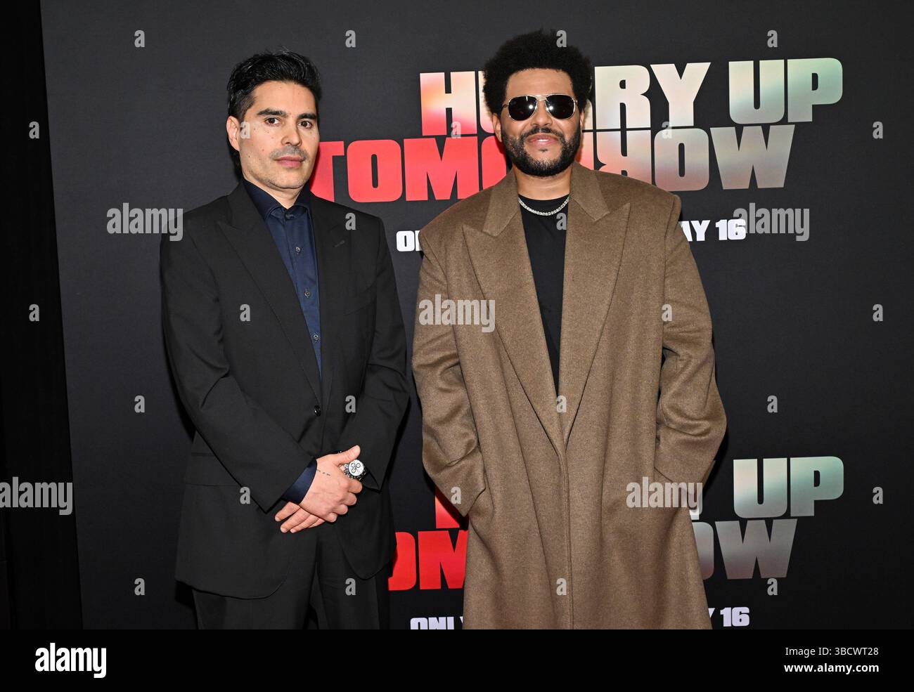 Reza Fahim, left, and Abel Tesfaye attend the premiere of "Hurry Up ...