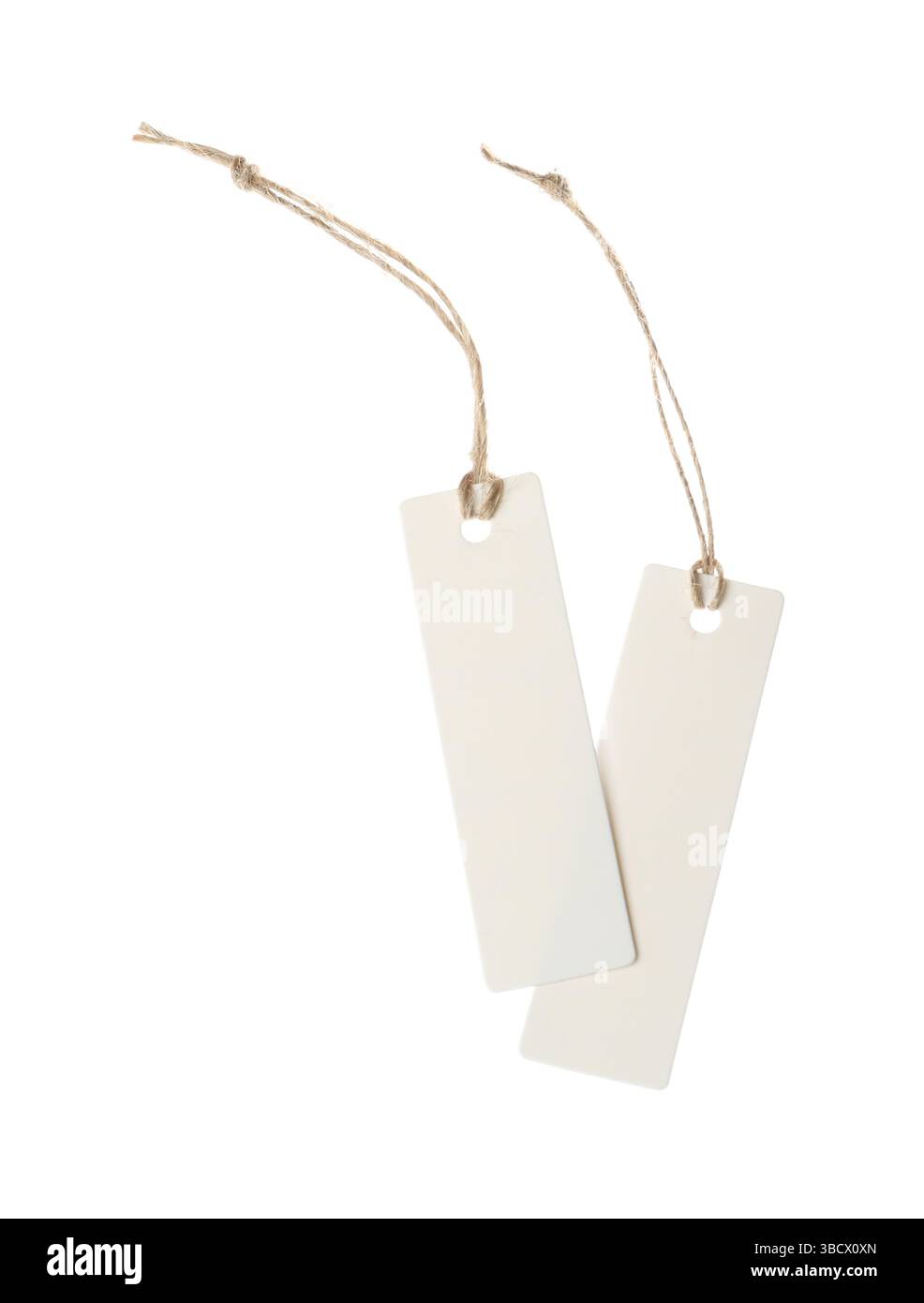 Blank tags with strings isolated on white Stock Photo - Alamy