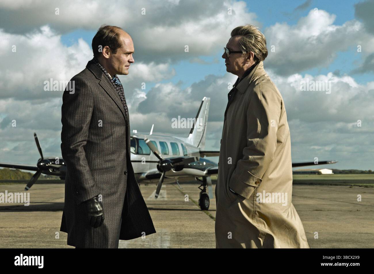 David Dencik (L) as "Toby Esterhase" and Gary Oldman (R) as "George Smiley" in Focus Features ...