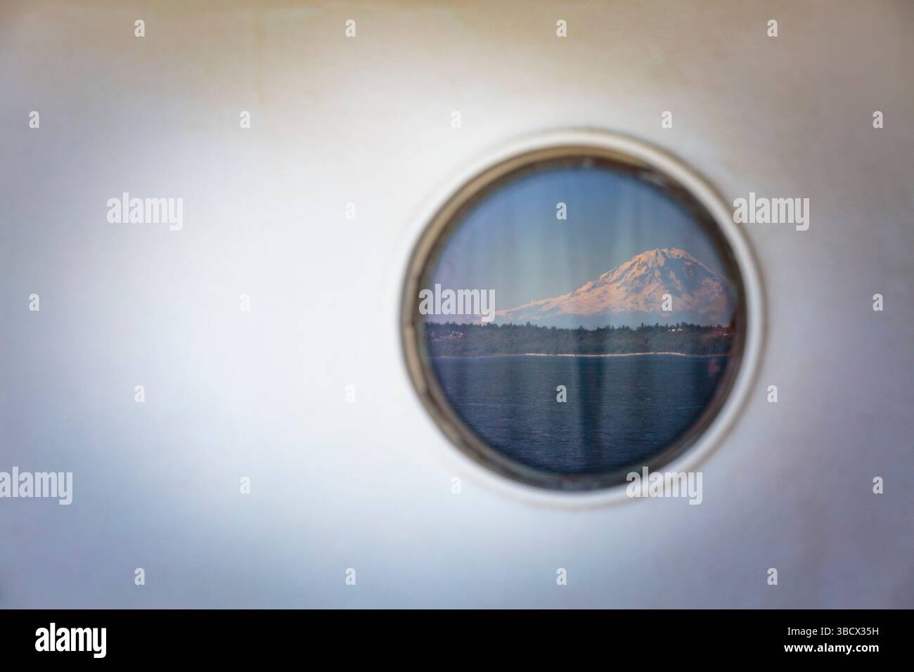 Porthole window, Kingston to Edmonds ferry on Puget Sound, Washington ...