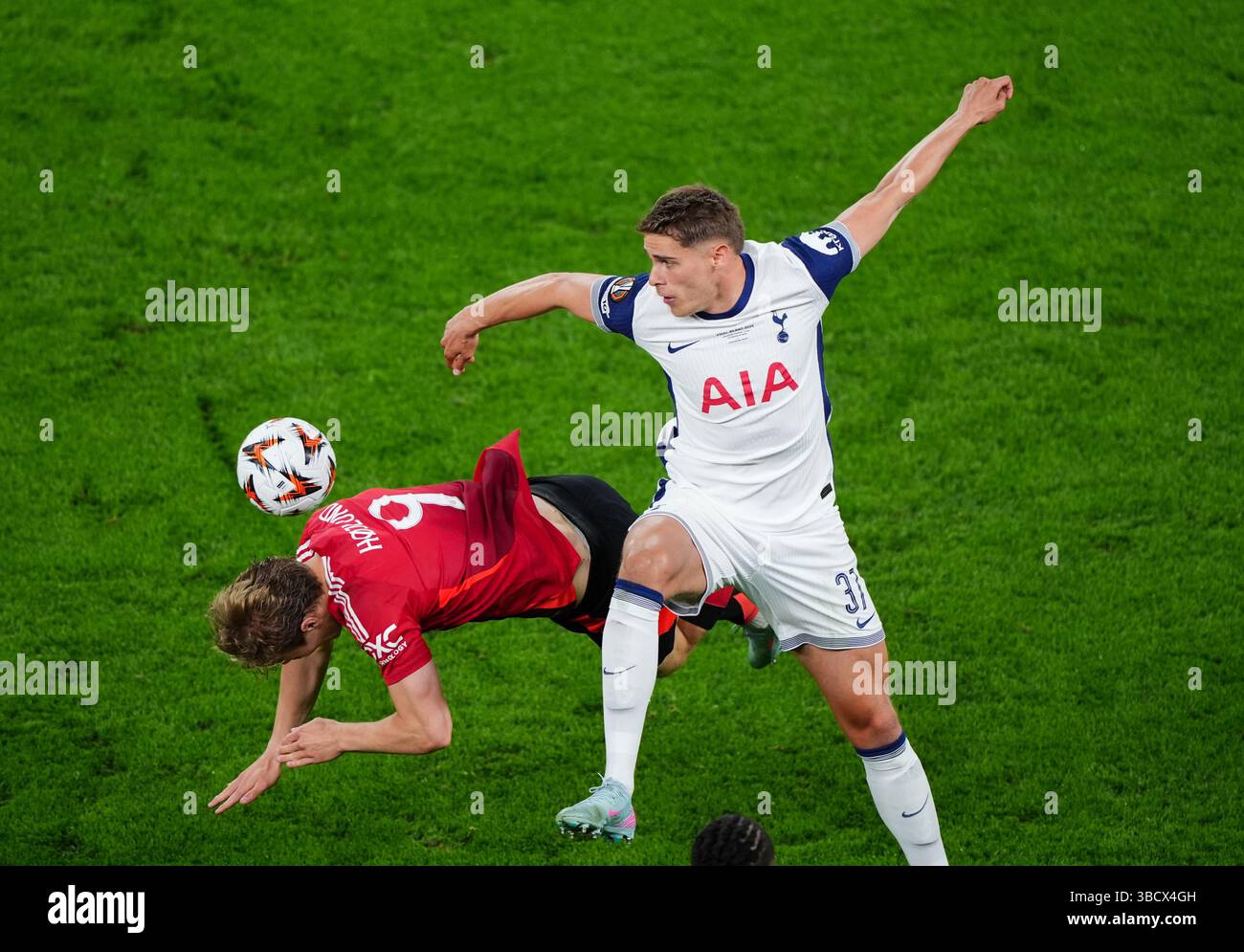 Tottenham Hotspur's Micky van de Ven and Manchester United's Bruno ...