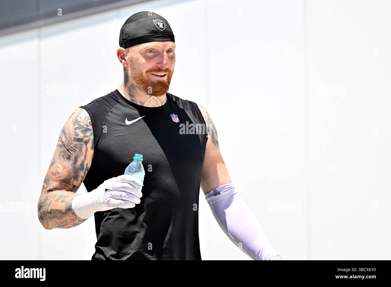 Las Vegas Raiders defensive end Maxx Crosby arrives to speak with the media after NFL football ...
