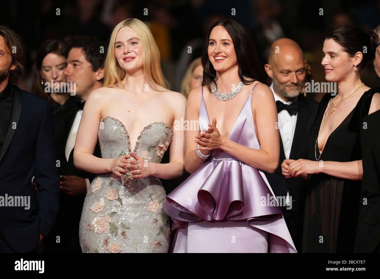 Elle Fanning, from left, Renate Reinsve and Inga Ibsdotter Lilleaas pose for photographers upon ...