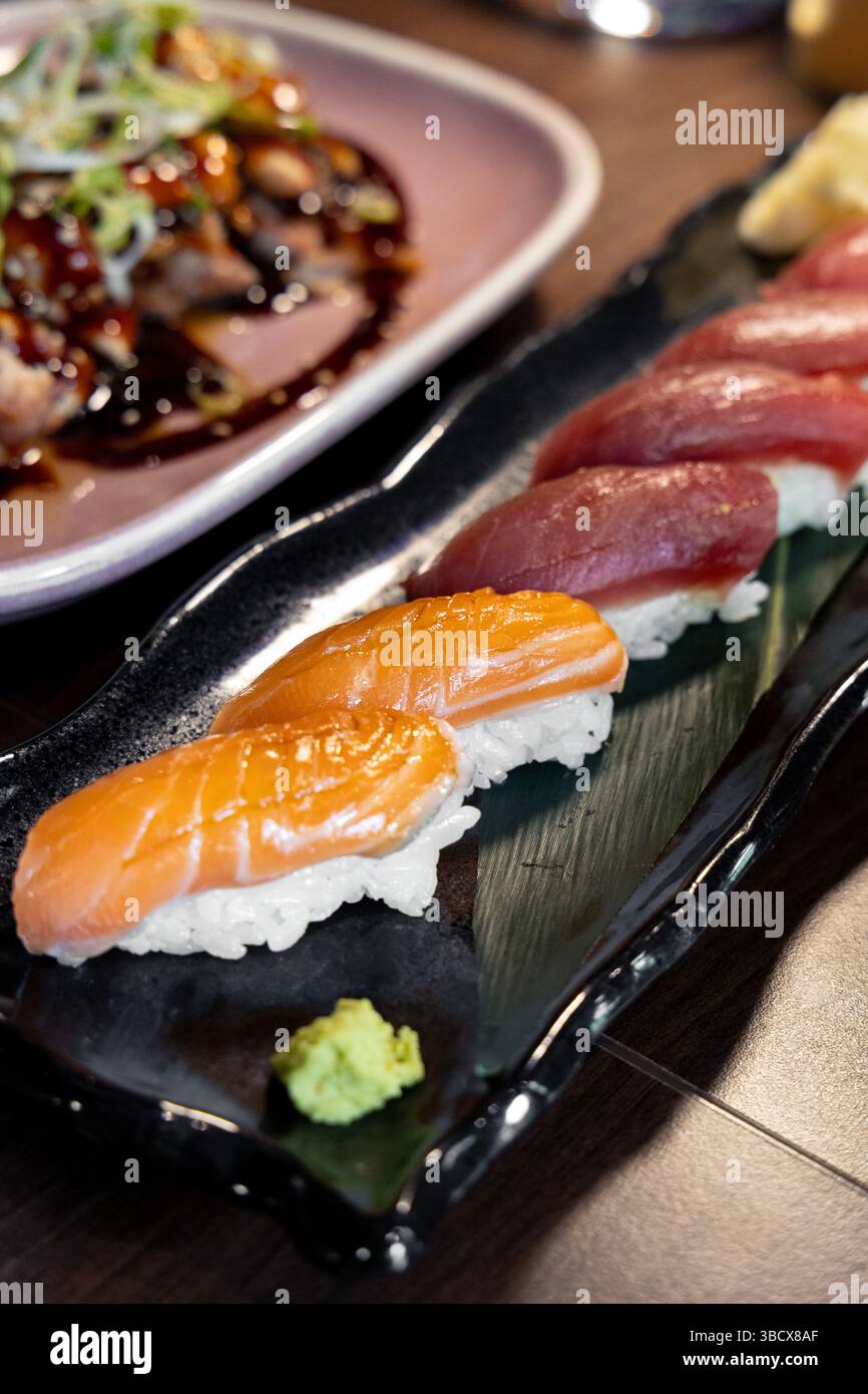 Salmon and bluefin tuna nigiri and chicken teriyaki at Bamboo Mat ...