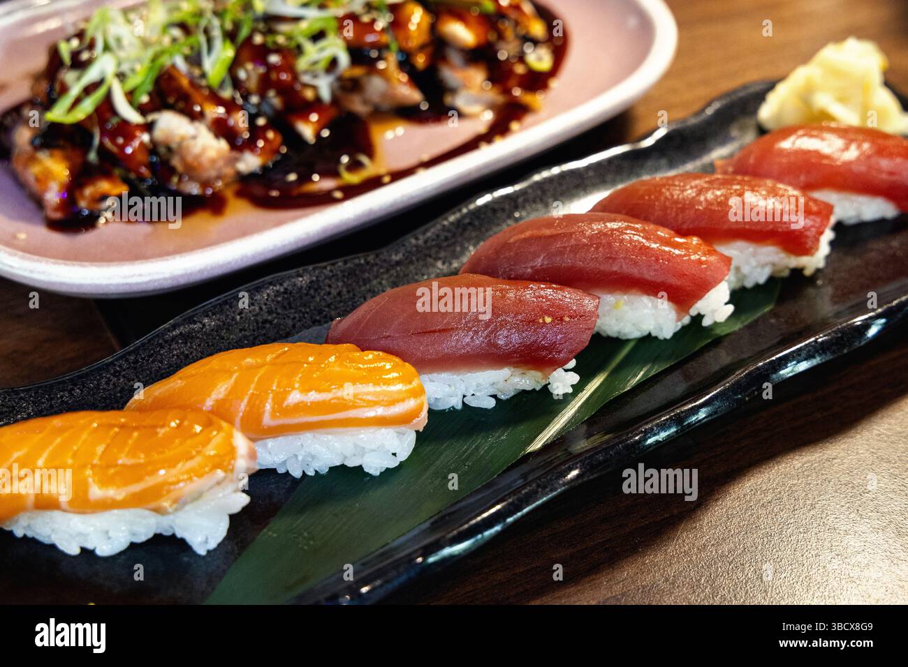 Salmon and bluefin tuna nigiri and chicken teriyaki at Bamboo Mat ...