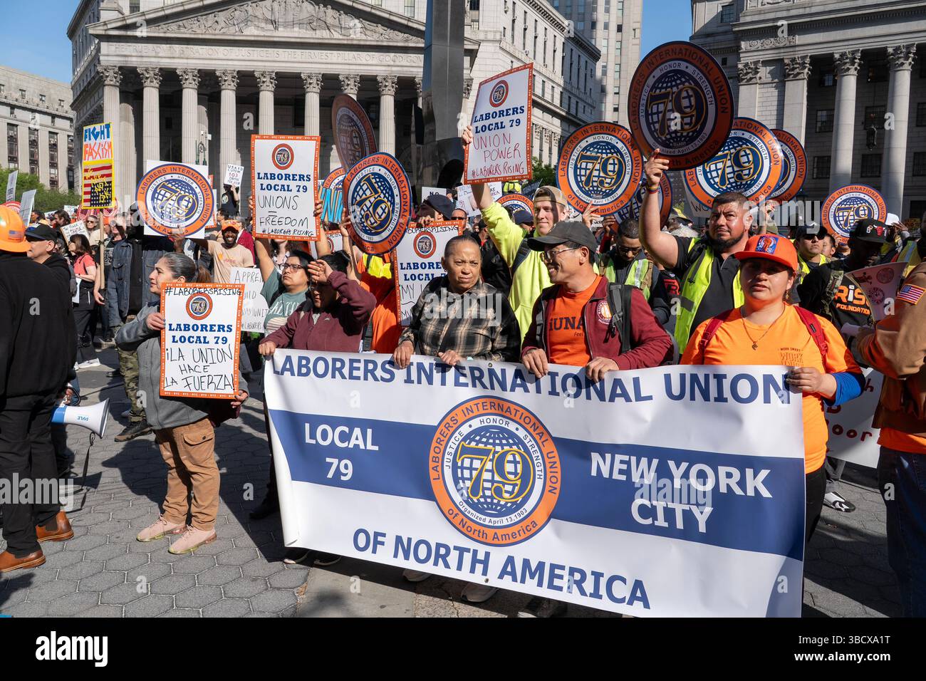 Workers and Union members rally on May Day for solidarity in protecting ...