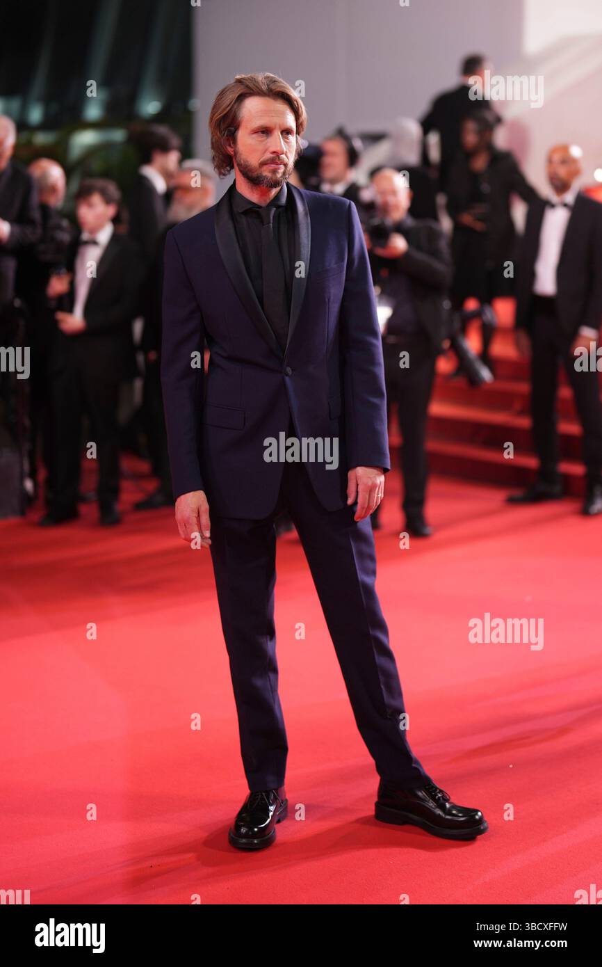 Anders Danielsen Lie poses for photographers upon departure from the ...