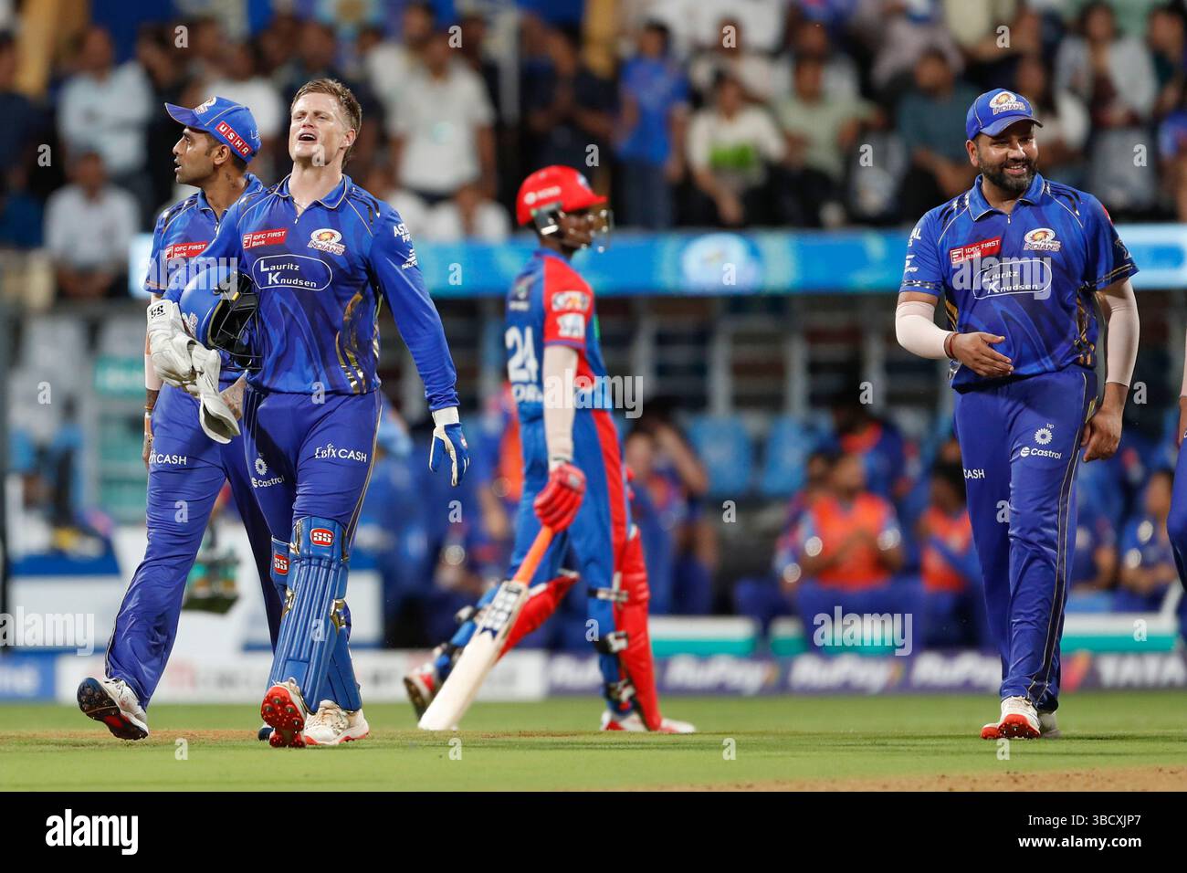 Mumbai, India. 21st May, 2025. MUMBAI, INDIA - MAY 21: Rohit Sharma of Mumbai Indians (R), Ryan ...