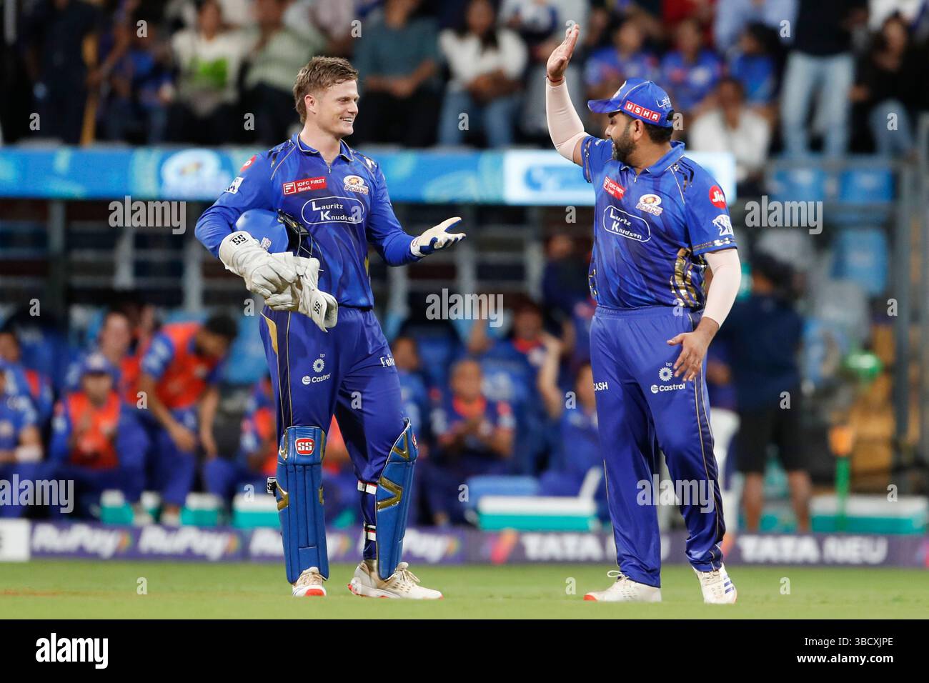 Mumbai, India. 21st May, 2025. MUMBAI, INDIA - MAY 21: Rohit Sharma of Mumbai Indians (R) and ...