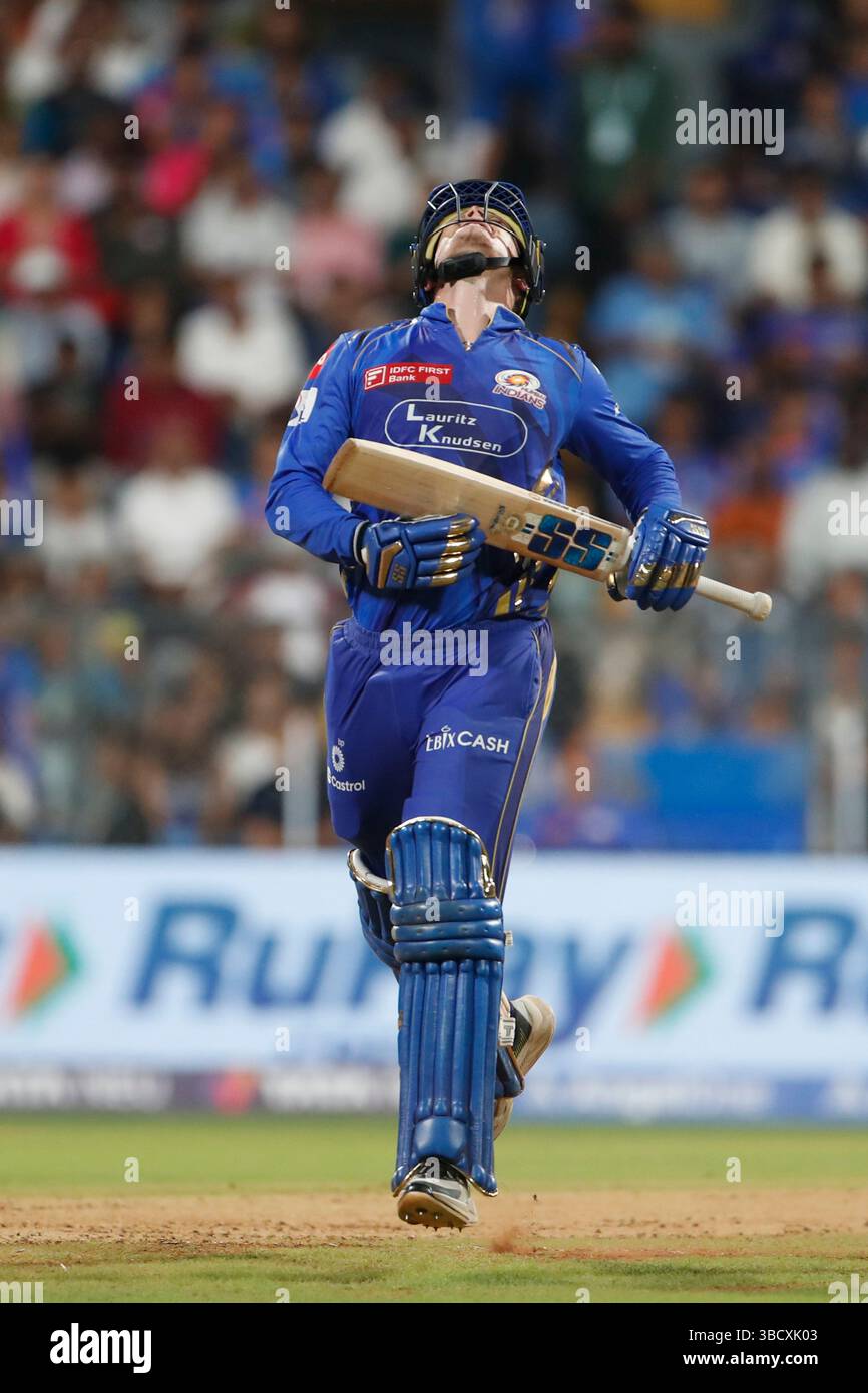 Mumbai, India. 21st May, 2025. MUMBAI, INDIA - MAY 21: Ryan Rickelton of Mumbai Indians react ...