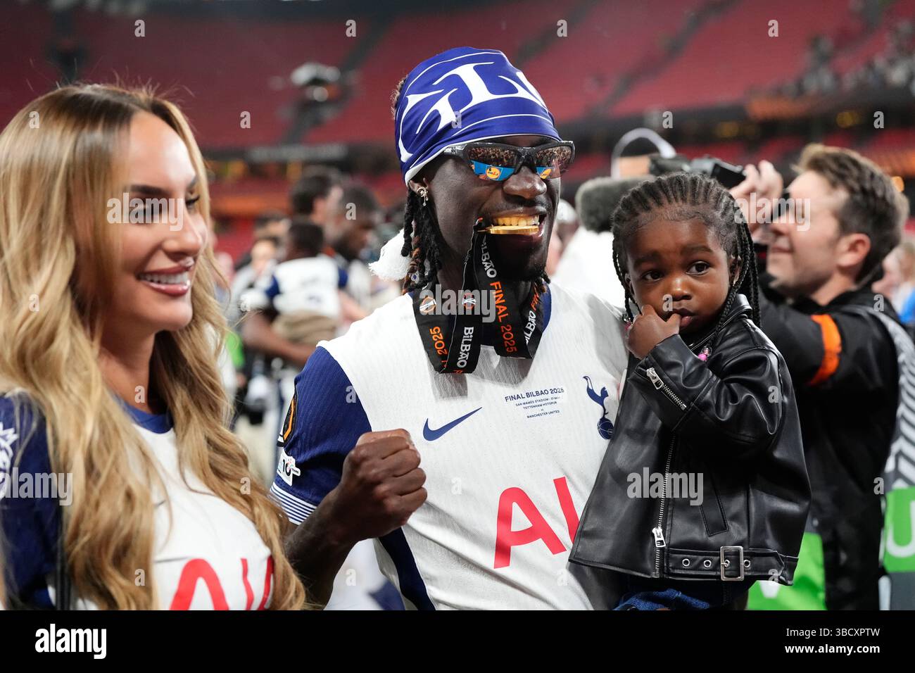 Tottenham Hotspur's Yves Bissouma (centre) celebrates with his family ...