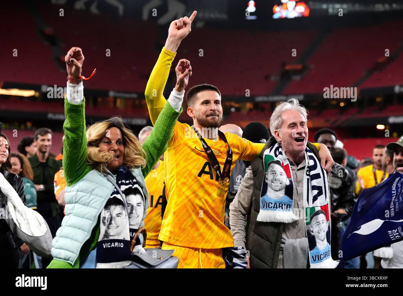 Tottenham Hotspur goalkeeper Guglielmo Vicario (centre) celebrates with ...