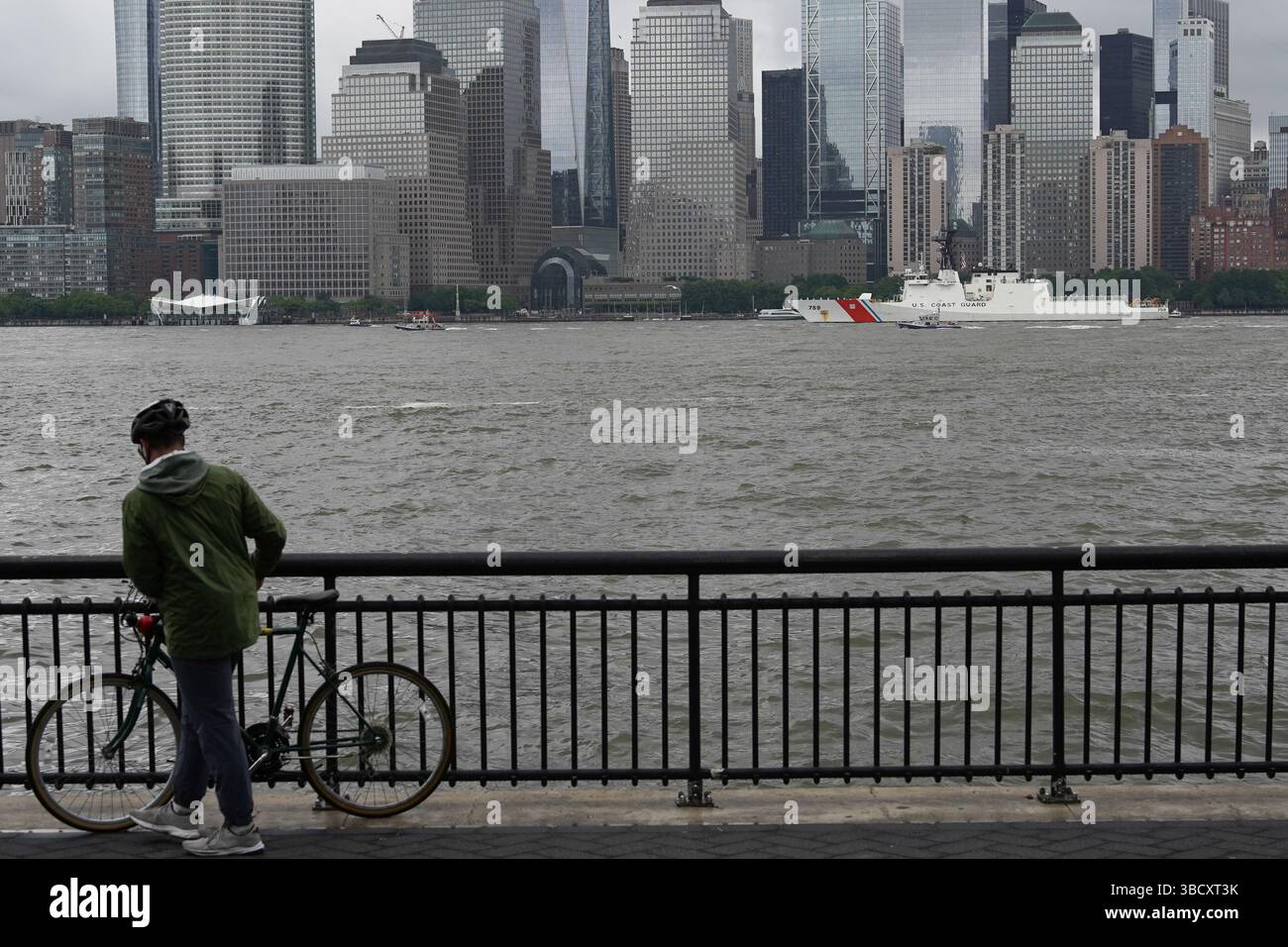 Manhattan, United States. 21st May, 2025. A cyclist takes a photo of ...