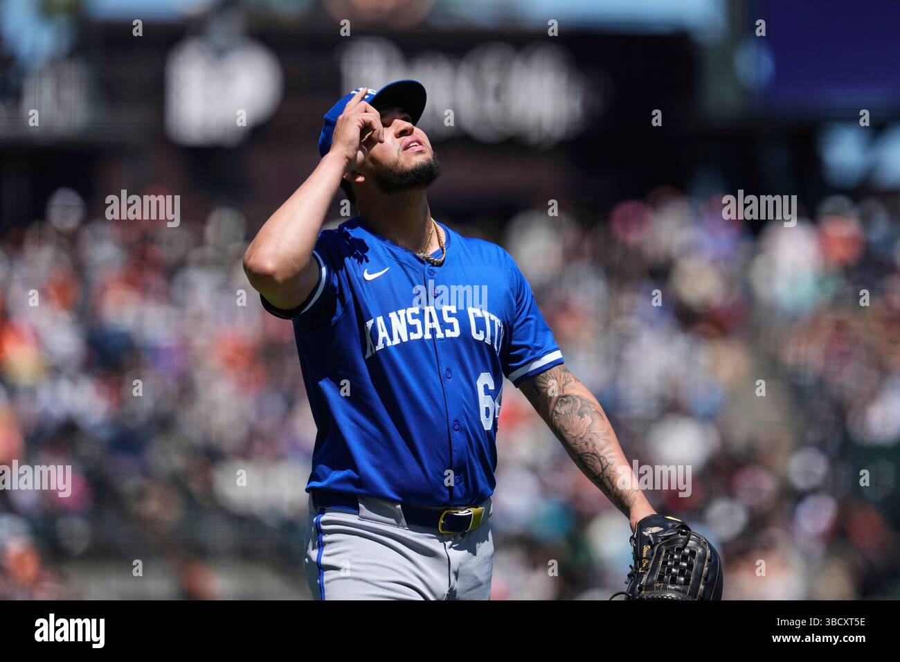Kansas City Royals' Steven Cruz walks to the dugout after pitching ...