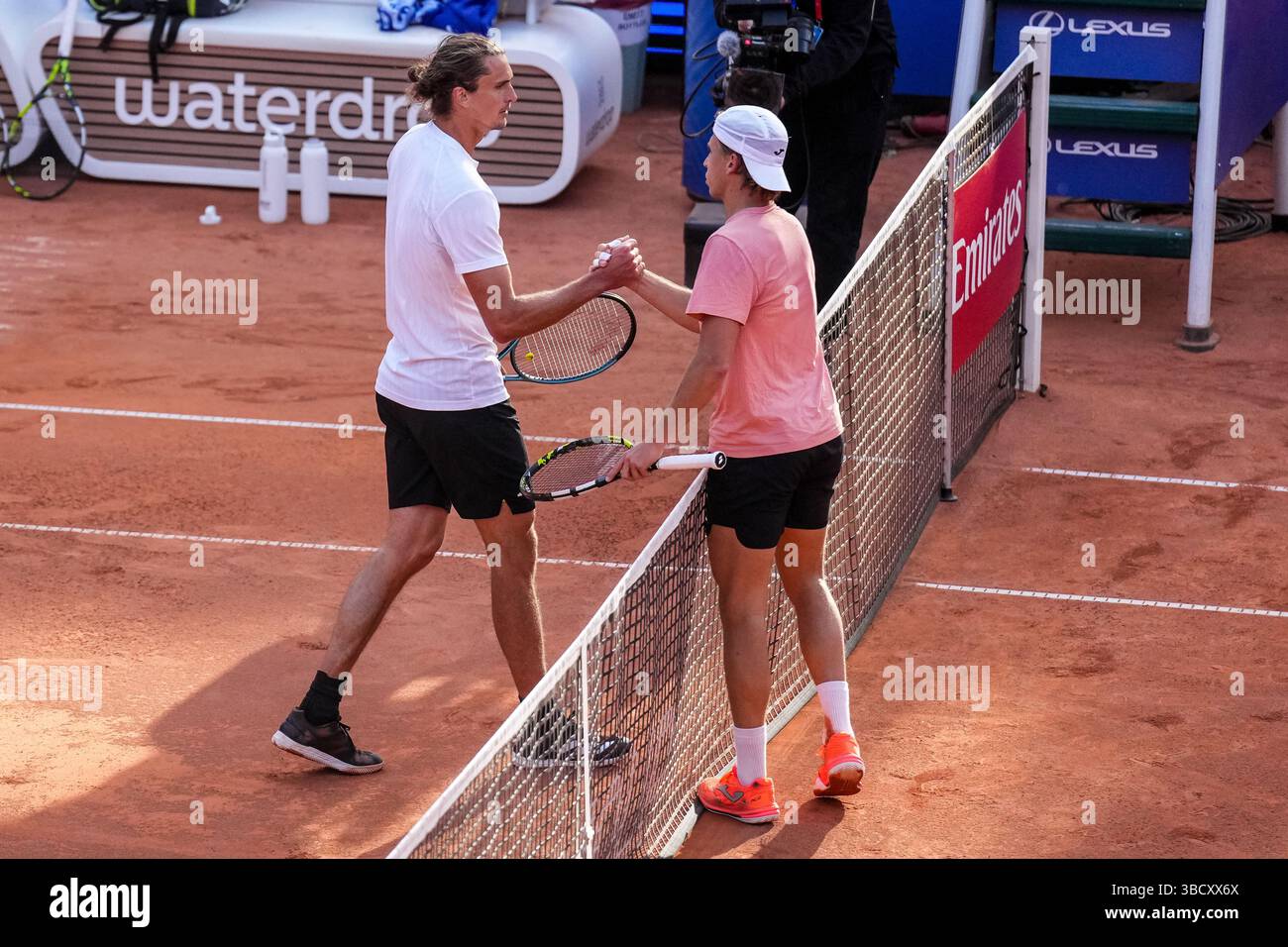HAMBURG, GERMANY - MAY 21: Alexander Zverev of Germany and Alexandre Muller of France shake ...