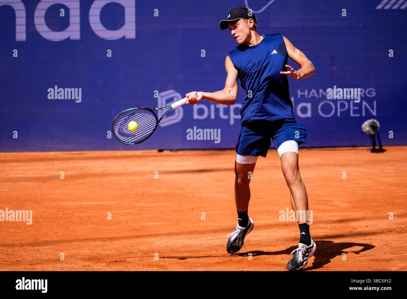HAMBURG, GERMANY - MAY 21: Justin Engel of Germany plays a forehand in ...