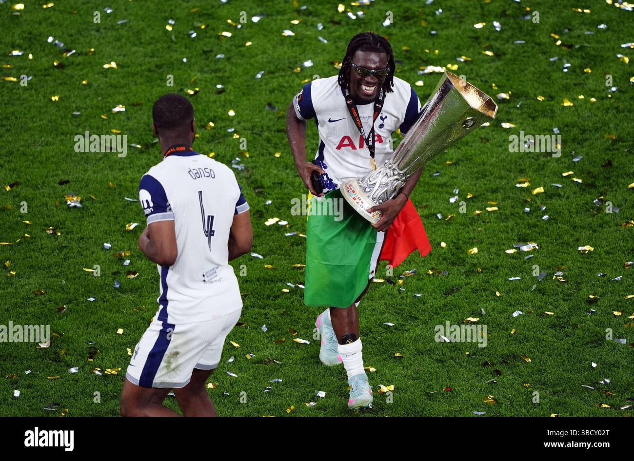 Tottenham Hotspur's Yves Bissouma celebrates with the trophy following ...