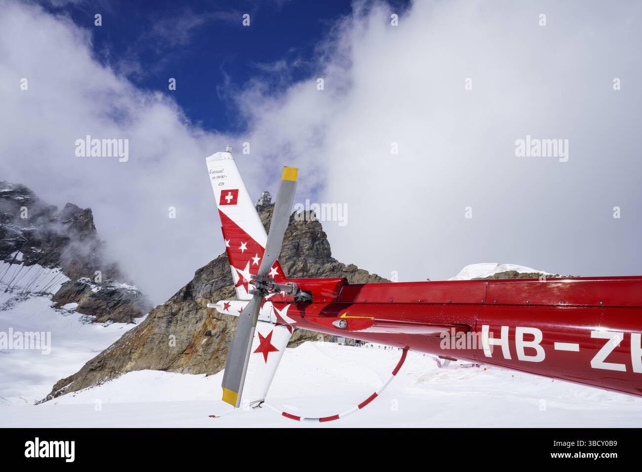 Swiss helicopter tail close up side view with red and white stars on ...