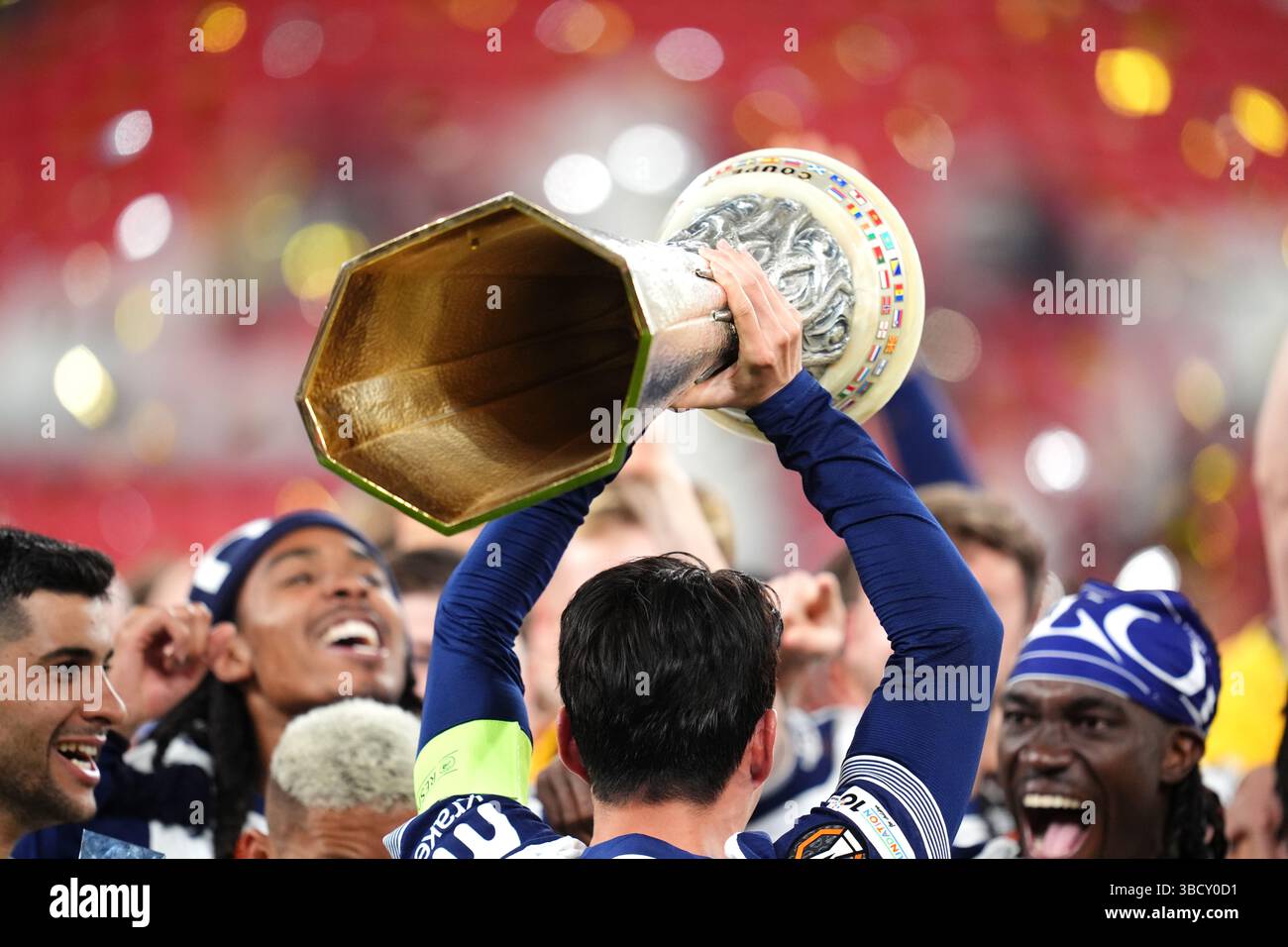 Tottenham Hotspur's Son Heung-Min with the trophy following the UEFA ...