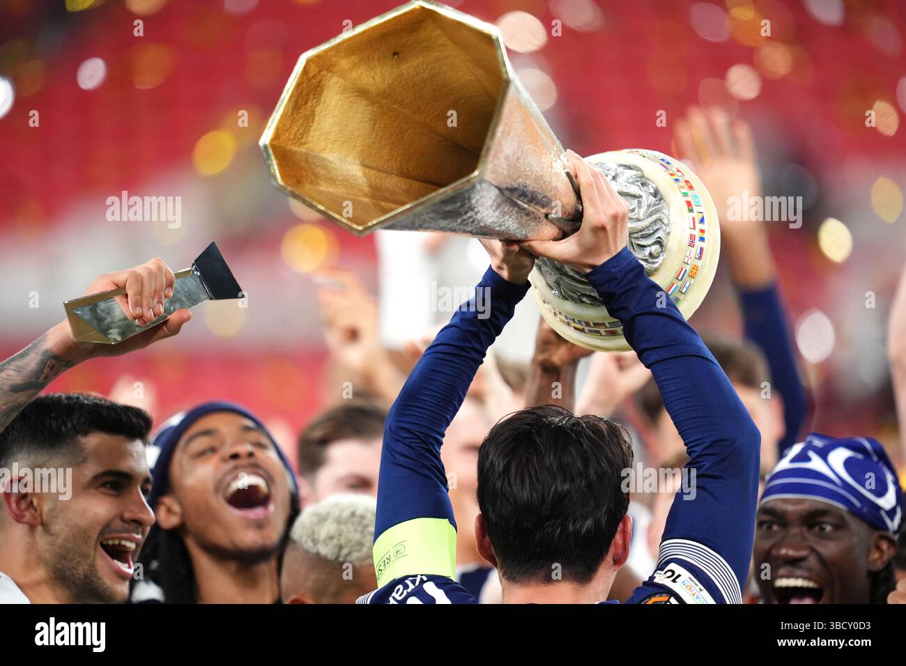 Tottenham Hotspur's Son Heung-Min with the trophy following the UEFA ...