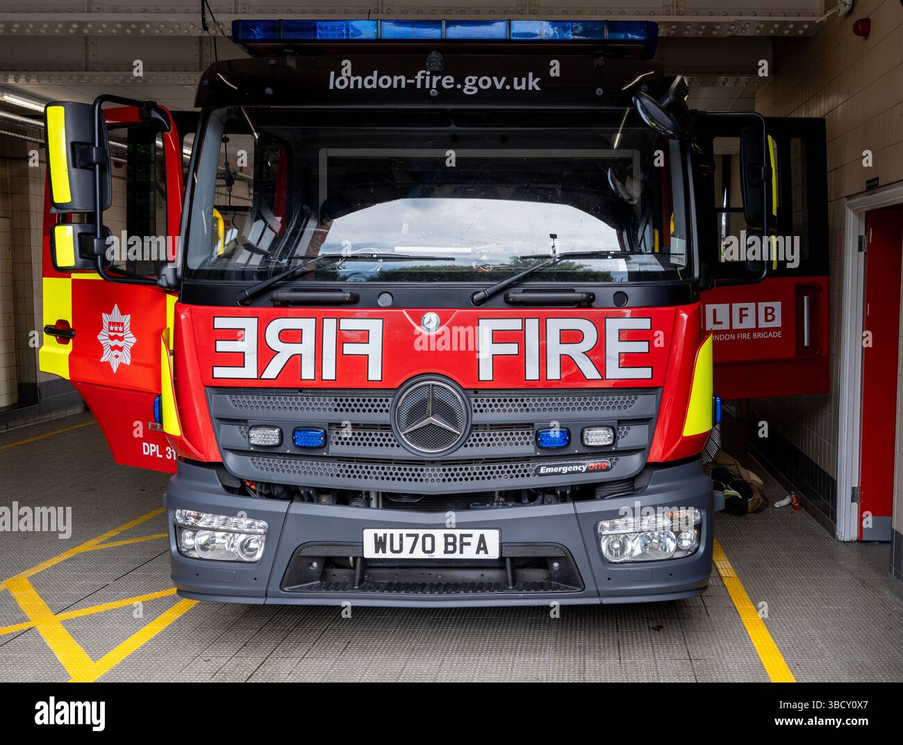 Fire engine from the London Fire Service, parked in garage Stock Photo ...