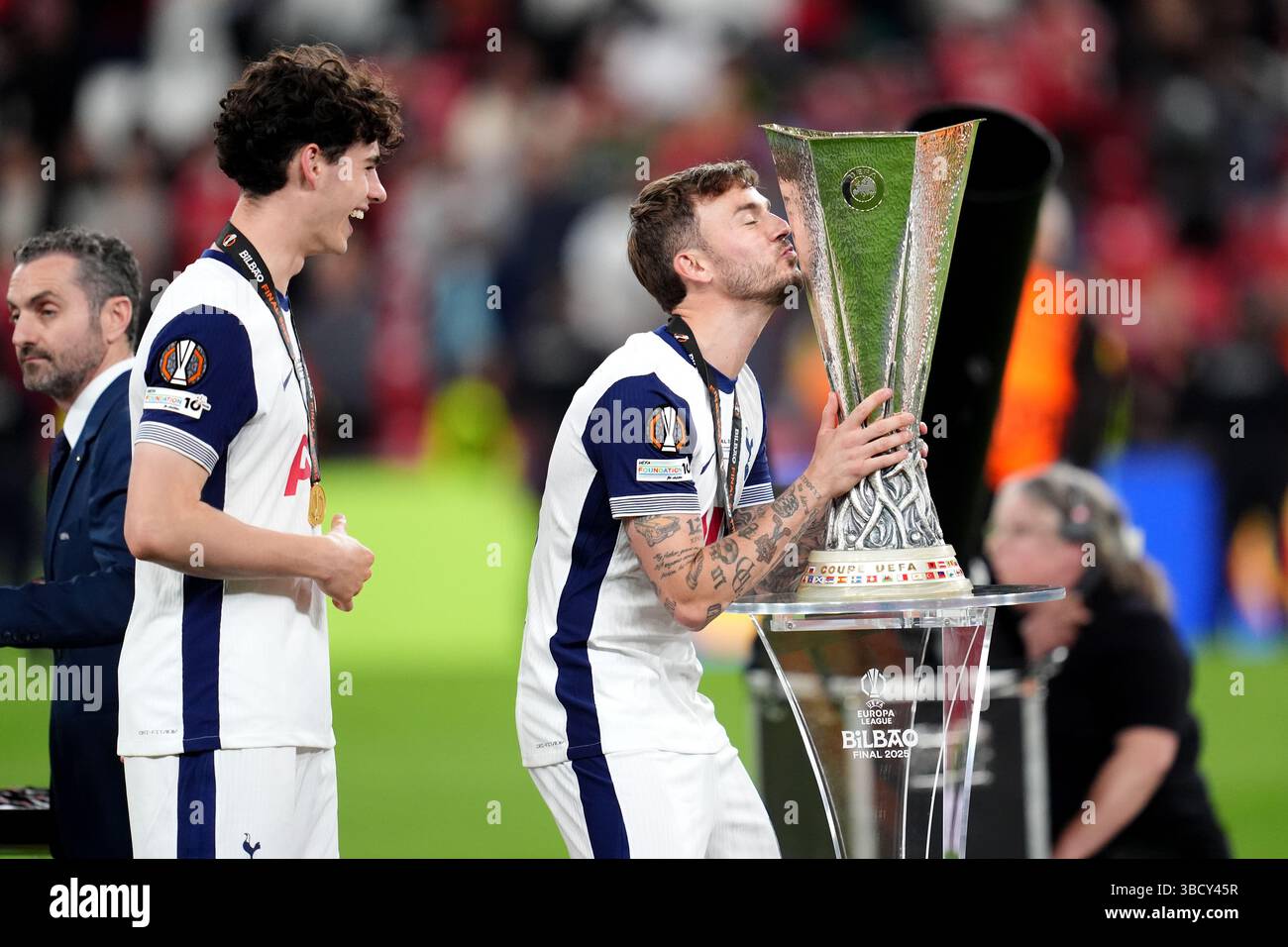 Tottenham Hotspur's James Maddison kisses the trophy as team-mate ...