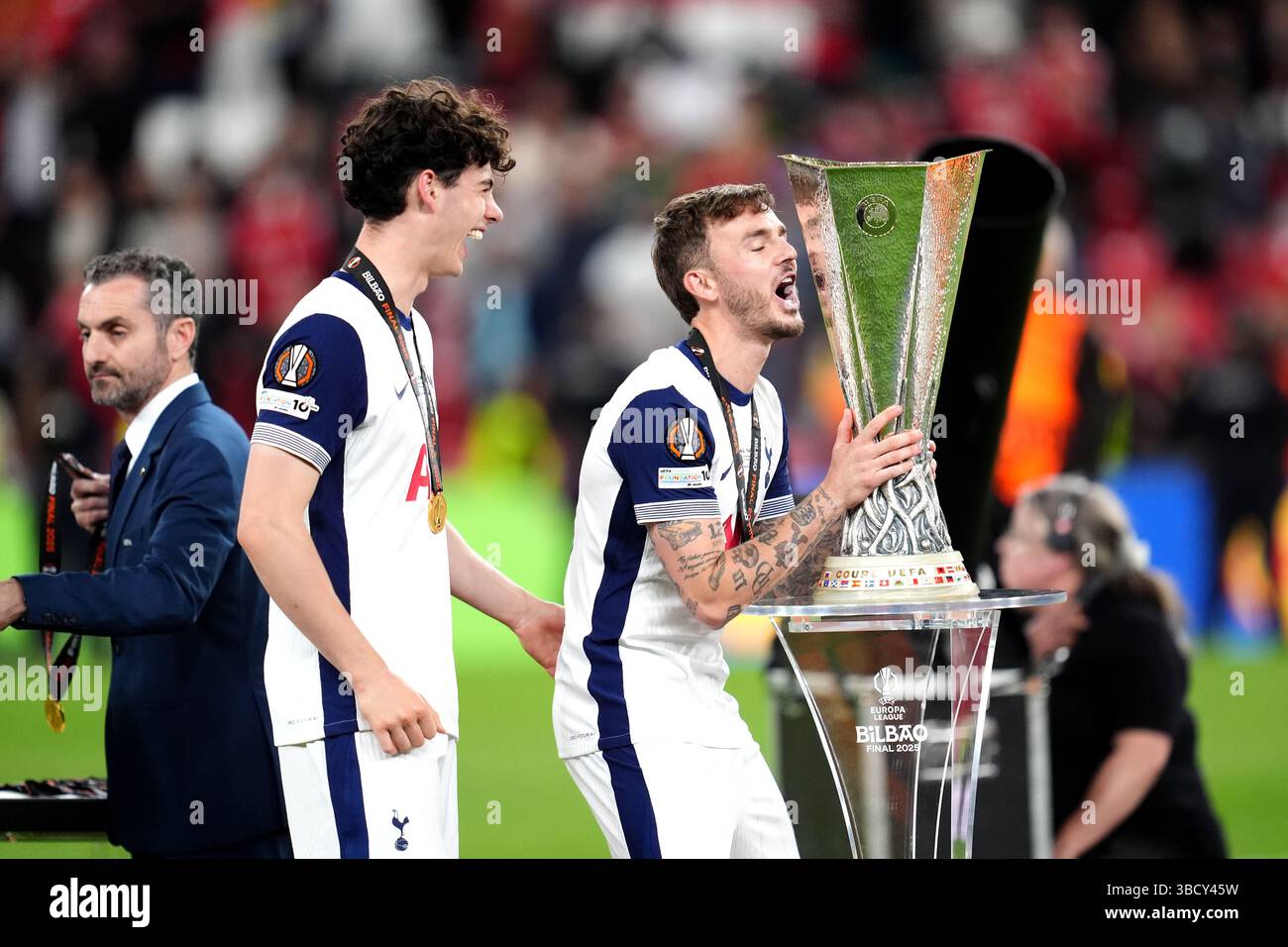 Tottenham Hotspur's James Maddison kisses the trophy as team-mate ...