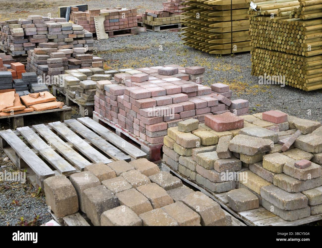 Clay bricks piled up in builder's yard, UK Stock Photo - Alamy