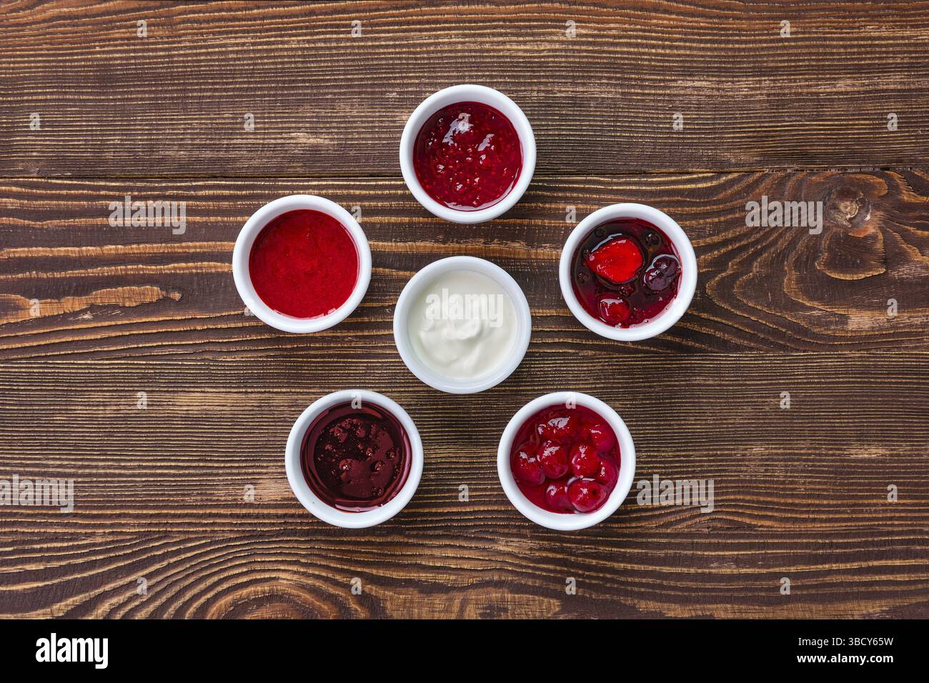 Overhead view of assortment of fruit puree. Jam, confiture, chutney or ...