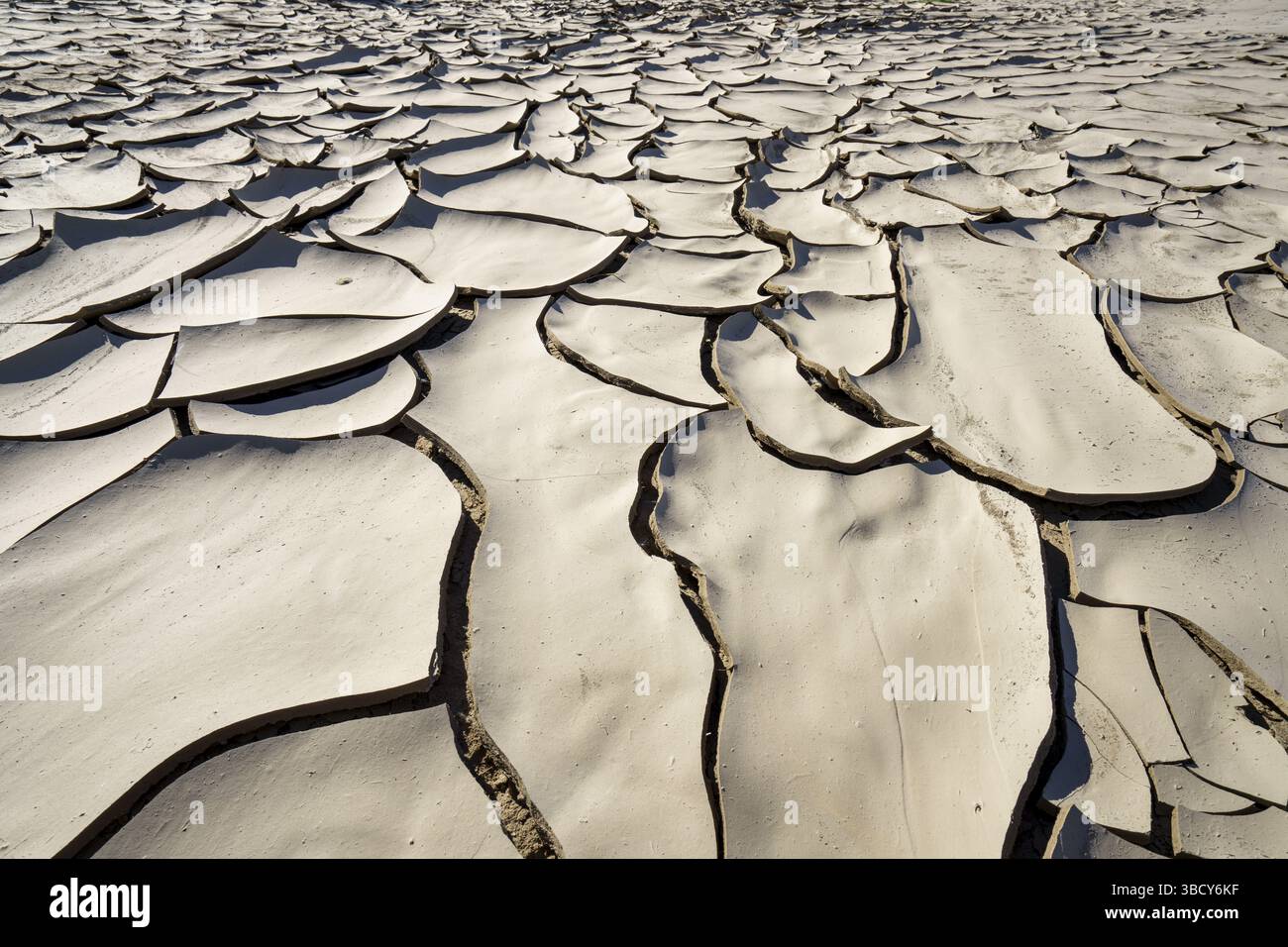 Parched ground, cracked clay mud in dried up river bed, dry riverbed ...