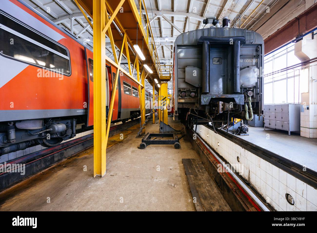 Carriage of electric train at service on jack screw in train repair ...