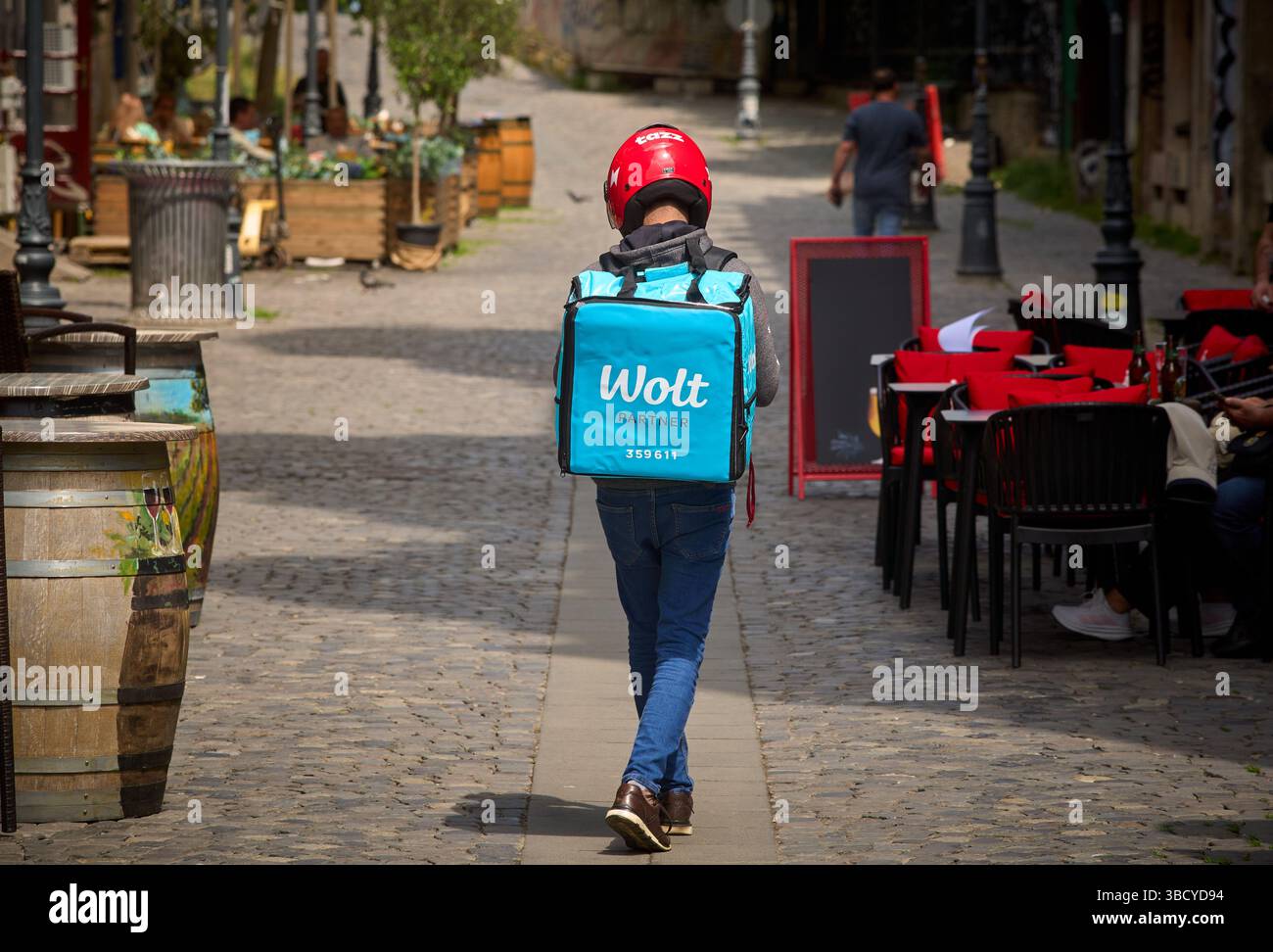 Bucharest, Romania. 21st May, 2025: Wolt food delivery couriers deliver ...