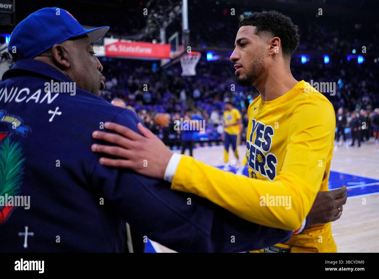 Indiana Pacers guard Tyrese Haliburton, right, greets Karl Towns Sr ...