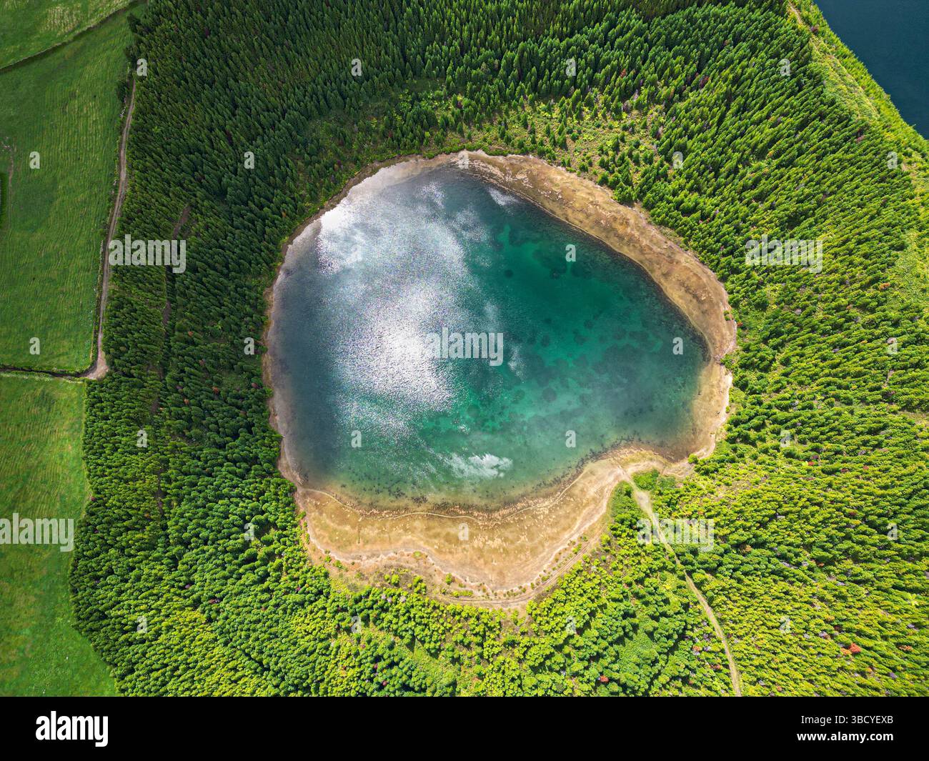 Picturesque aerial top view of Lagoa Rasa volcanic lake. Turquoise ...
