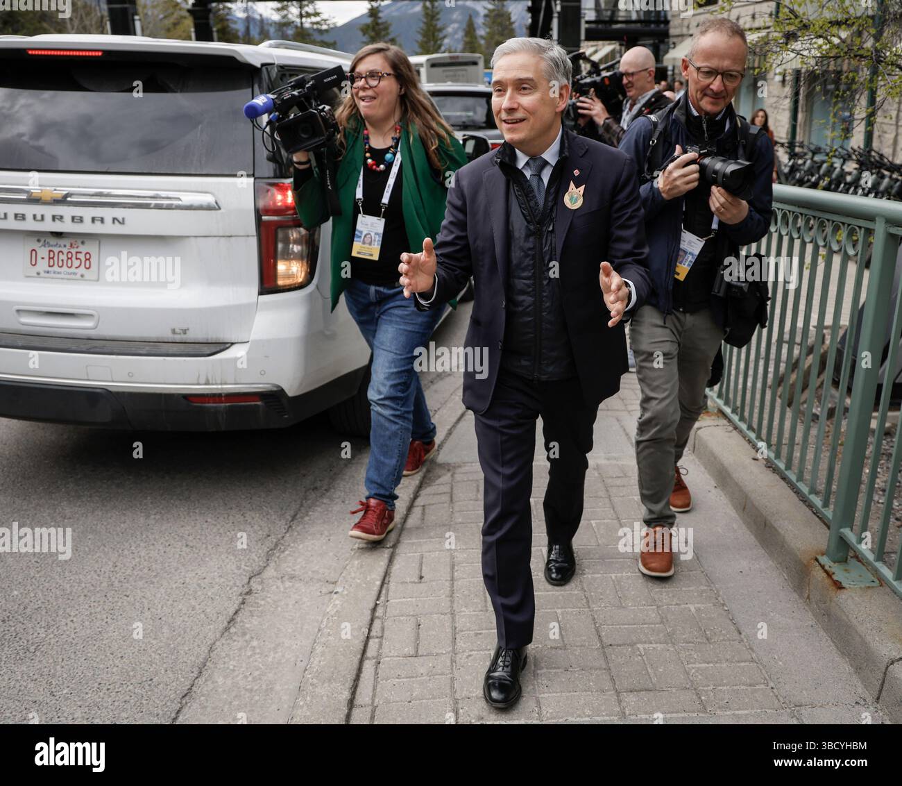 Canada's Finance Minister Francois-Philippe Champagne, centre, leaves ...