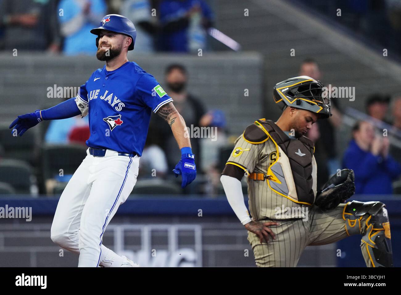 Toronto, Canada. 21st May, 2025. Toronto Blue Jays' Nathan Lukes (left ...