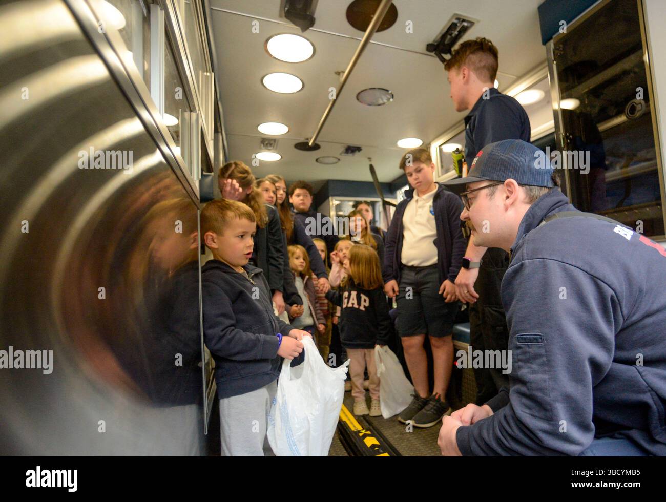 Brattleboro, Vt., Firefighter Finn McMillan talks with Jackson ...