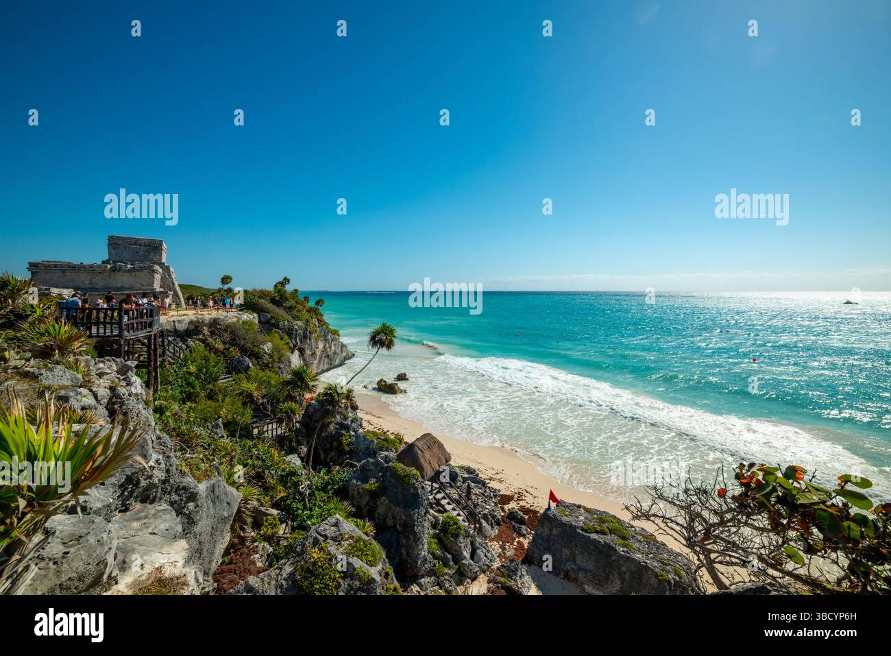 The Mayan Ruins of Tulum during a summer blue sky with some sargassum ...