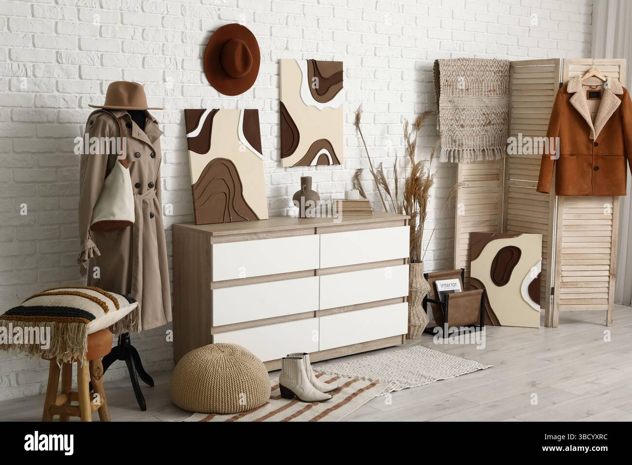Chest of drawers, folding screen with jacket, mannequin and paintings ...